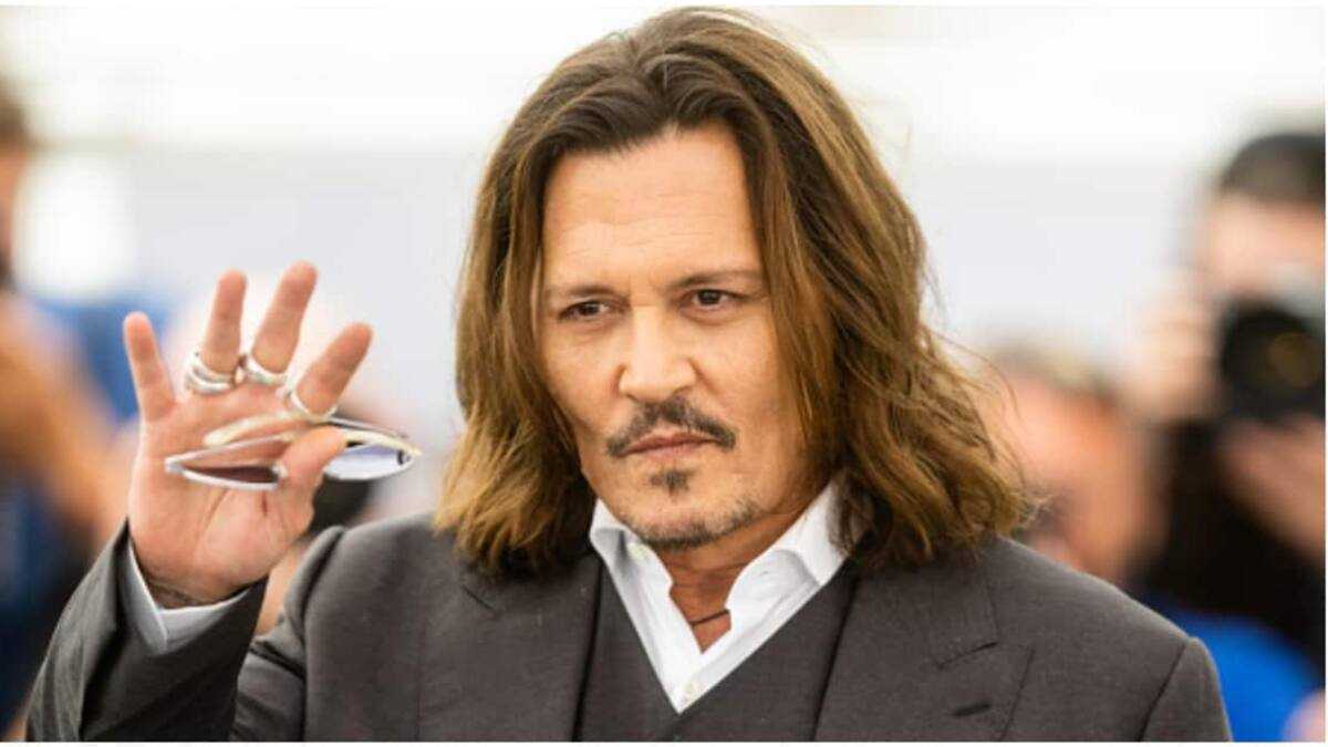 Johnny Depp Holds Back Tears During 7-Minute Standing Ovation for His ...