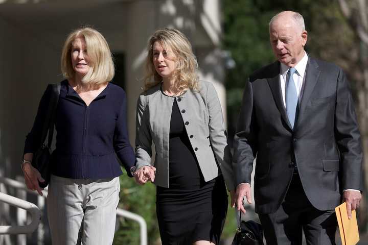 Who are Elizabeth Holmes' parents, Noel Anne Daoust and Christian ...